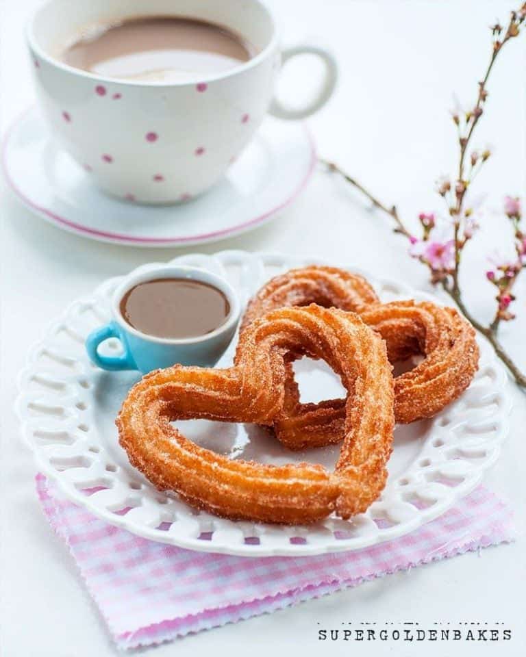 Heart-shaped churros with chocolate sauce